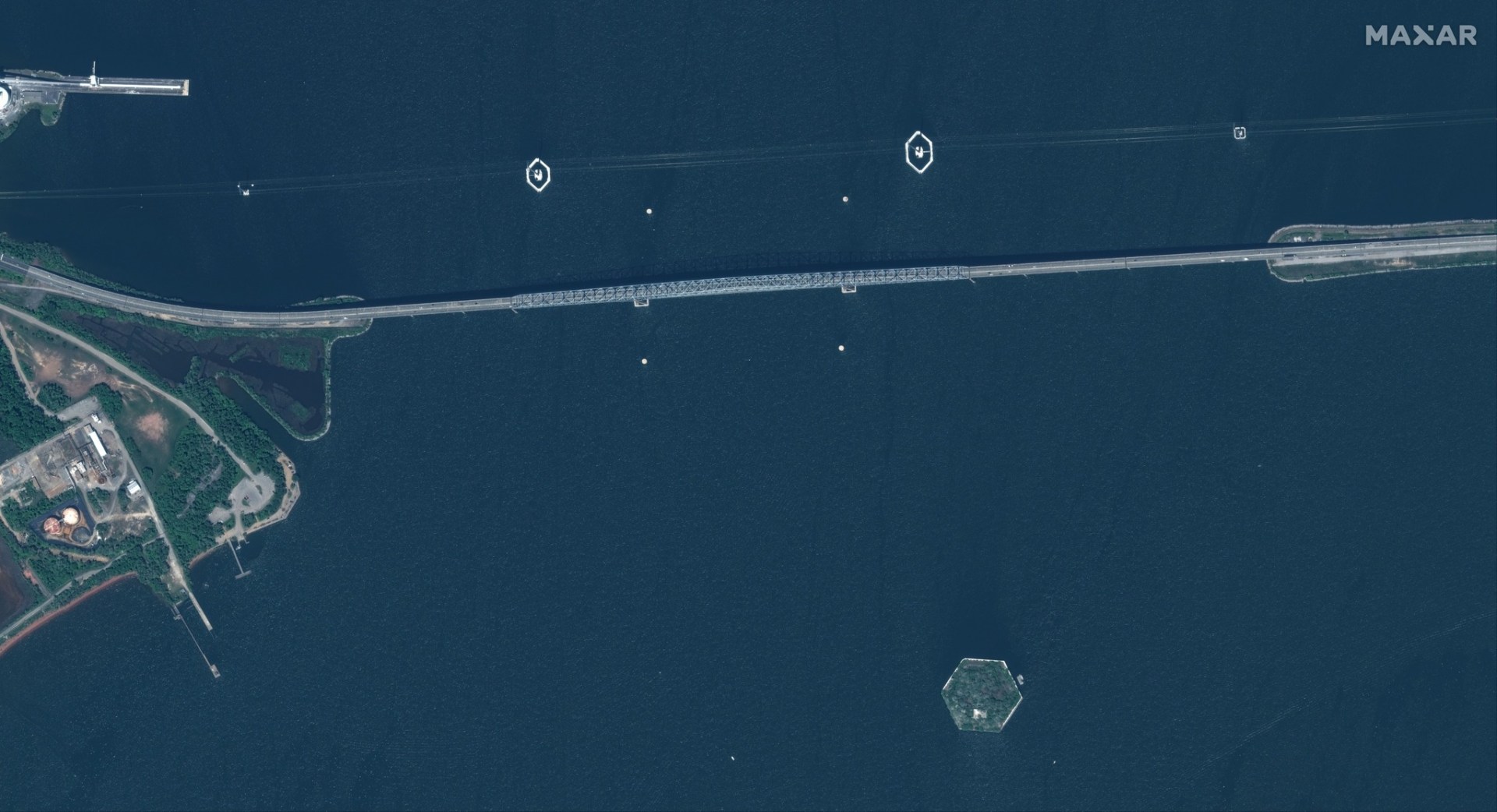 Satellite images capture Baltimore bridge collapse