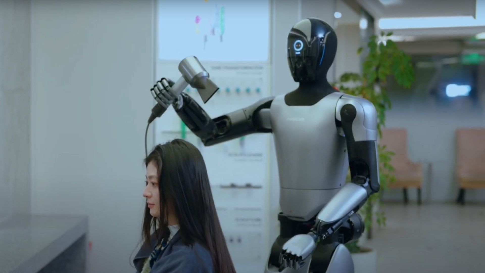 Watch China’s humanoid robot valet cars, style hair, assist in hotels