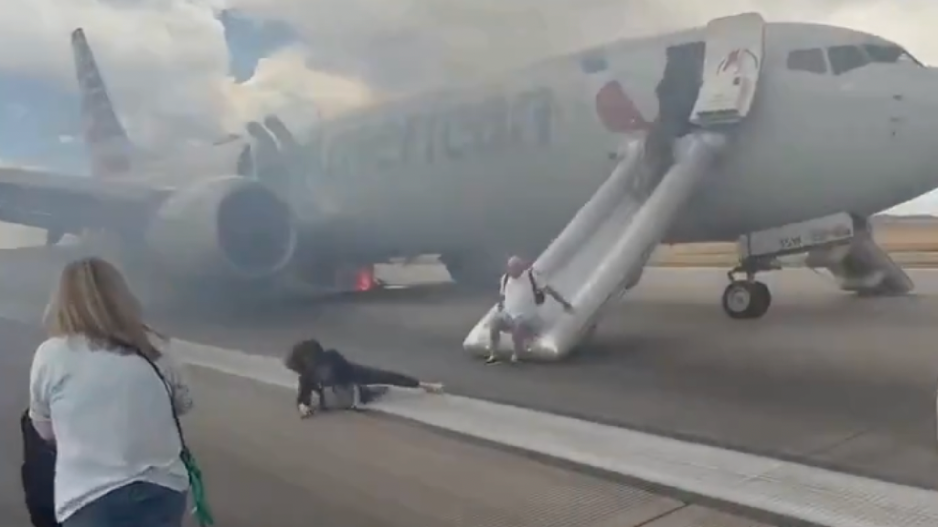 Video: American Airlines' plane catches fire before takeoff in Denver