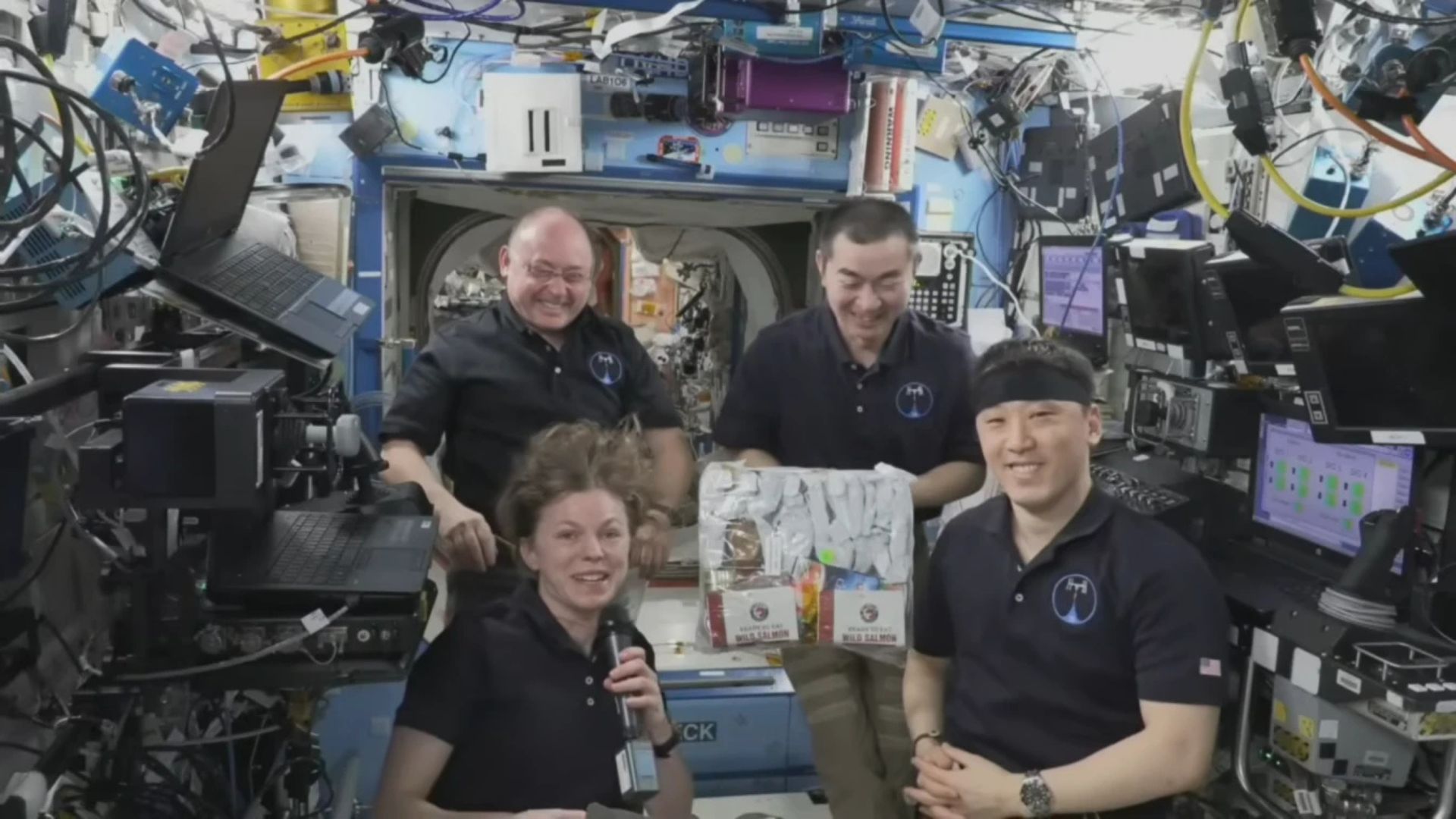 Thanksgiving in orbit: ISS crew enjoys holiday meal together